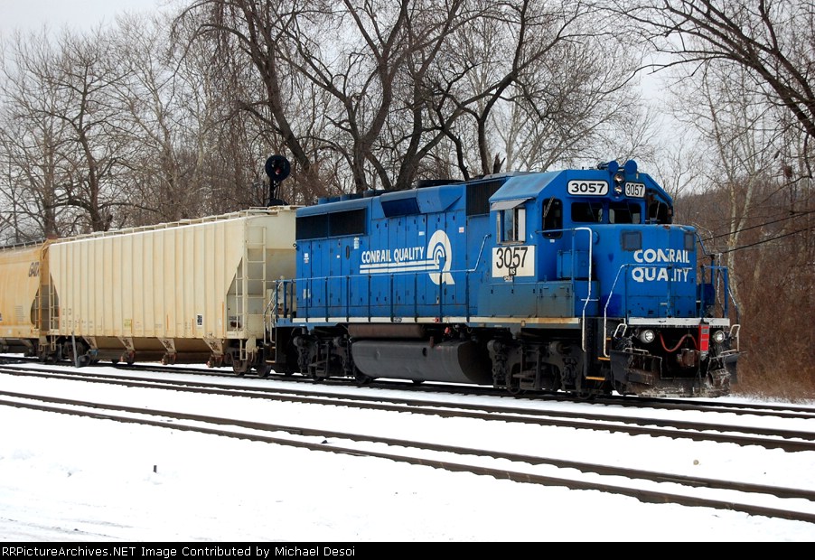 NS GP-40-2 #3057 still in Conrail Quality Colors pushes an eastbound at CP JU